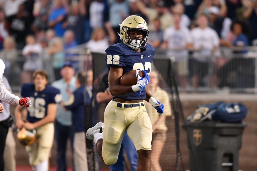 Touchdown! Scoring an Interview with EJ Smith // The Roundup
